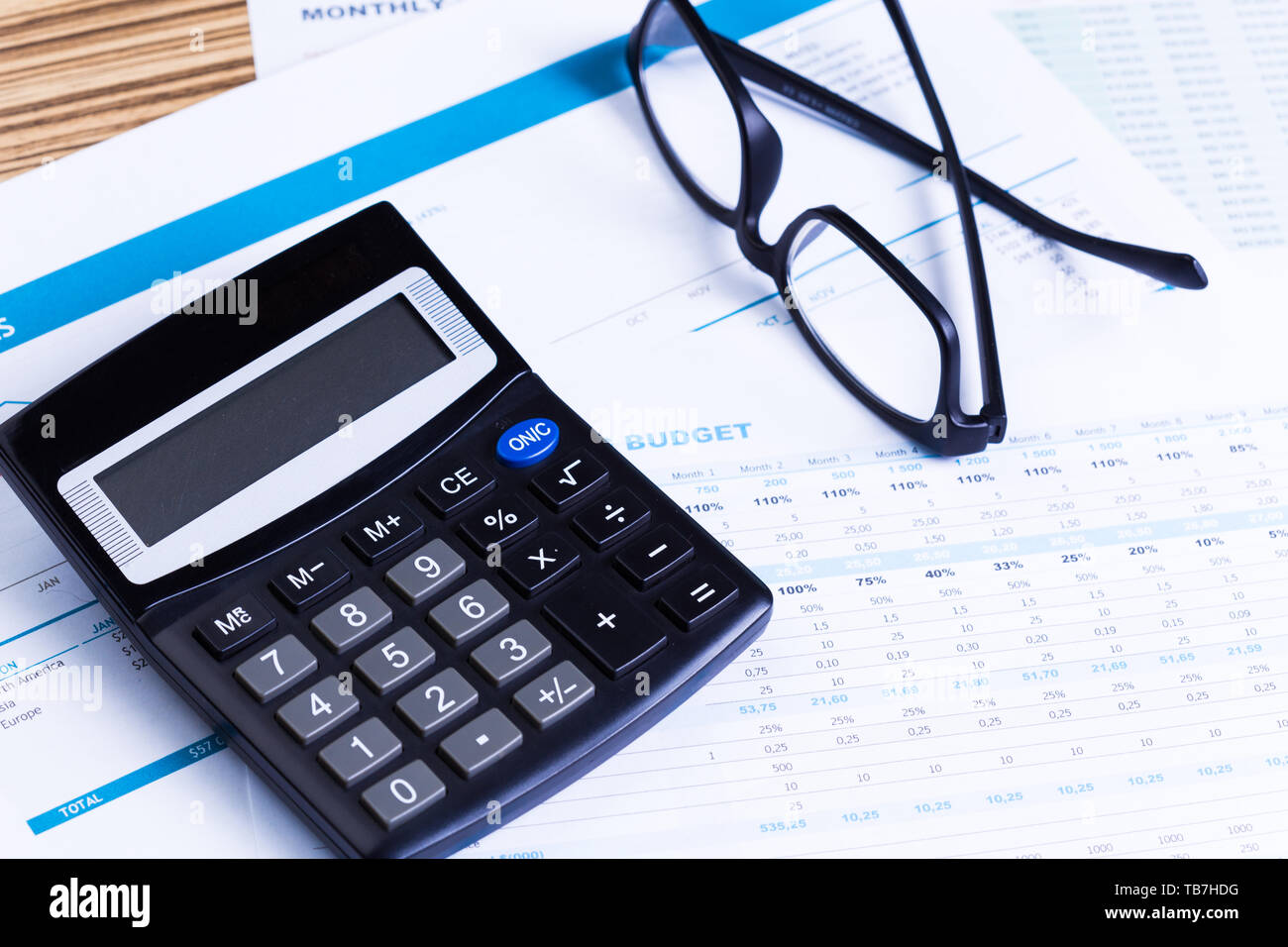 Graphs and Calculator Stock Photo - Alamy
