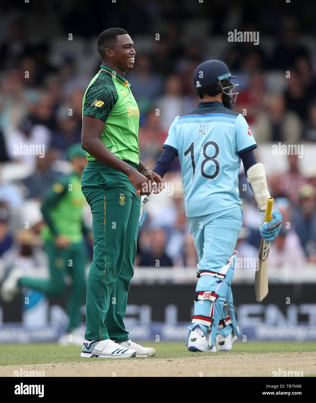 South Africa's Lungi Ngidi smiles after taking the wicket of England's ...