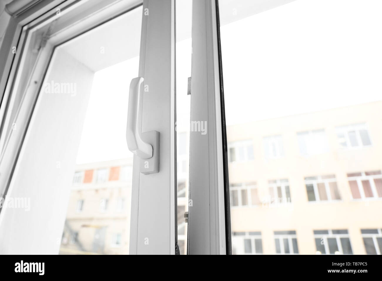 Modern open metal-plastic window Stock Photo - Alamy