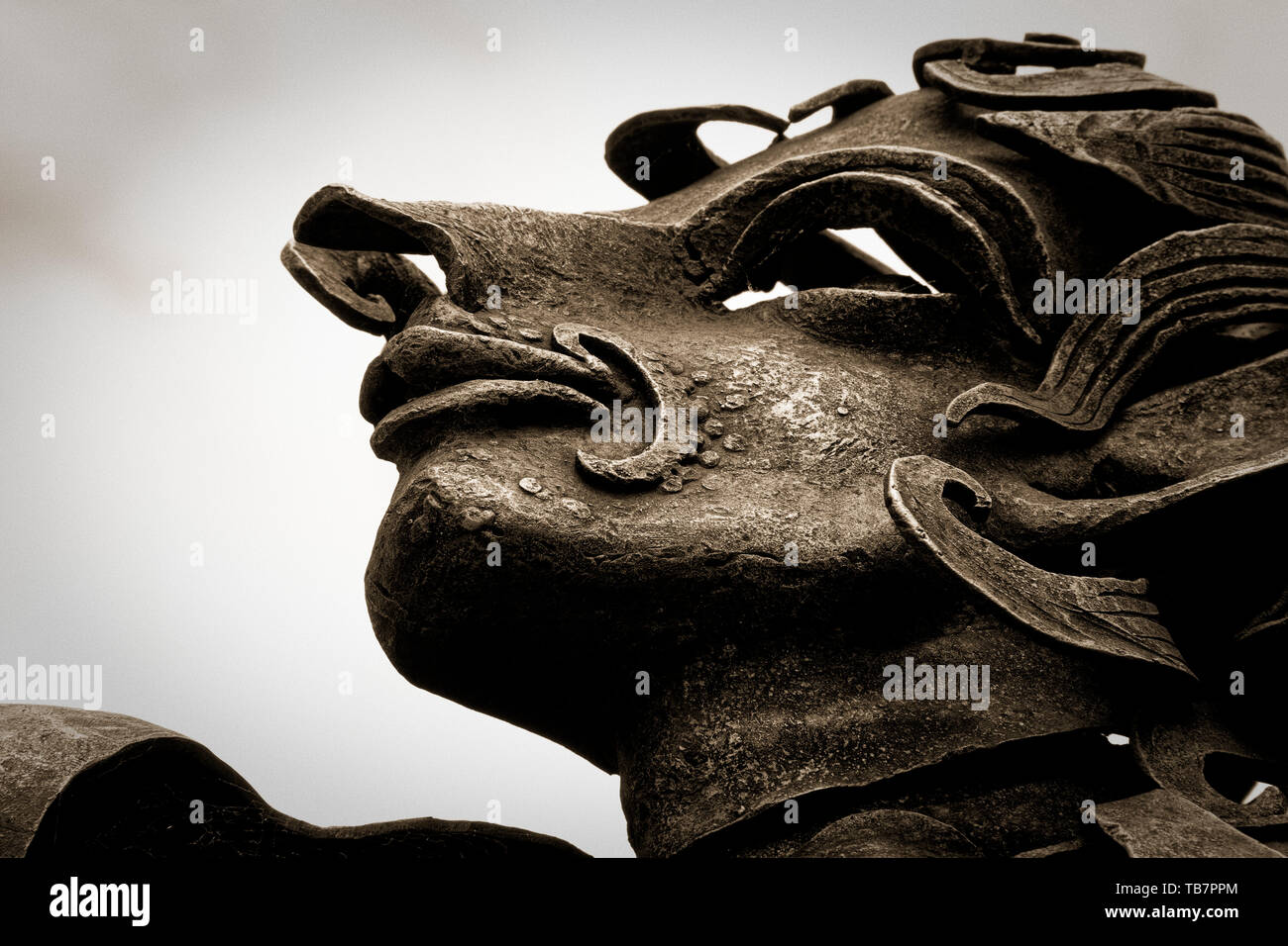 Face of an old rusty statue in public park Stock Photo - Alamy