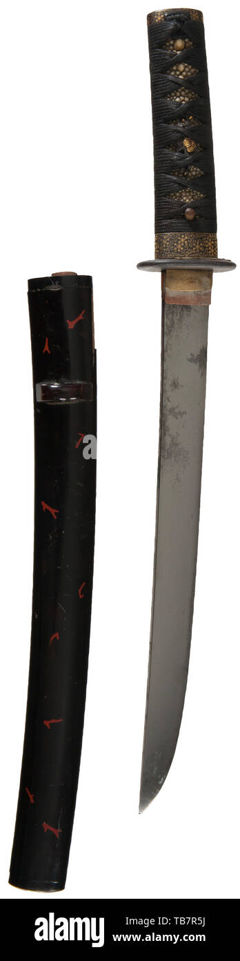 A Japanese Tanto, Handle wrapped with black cloth tape over white ray ...