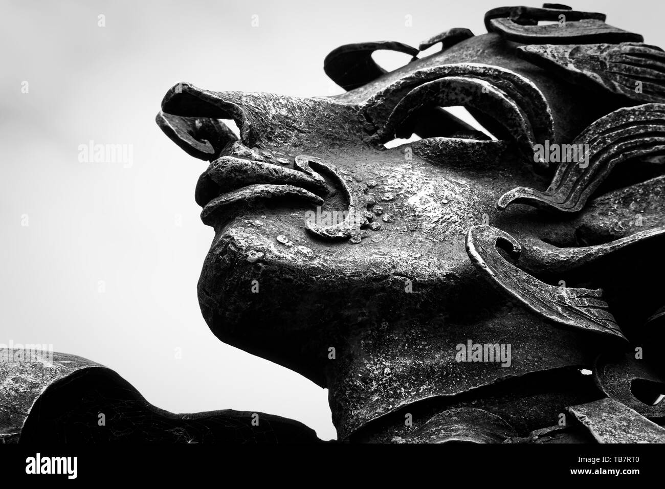Face of an old rusty statue in public park Stock Photo - Alamy