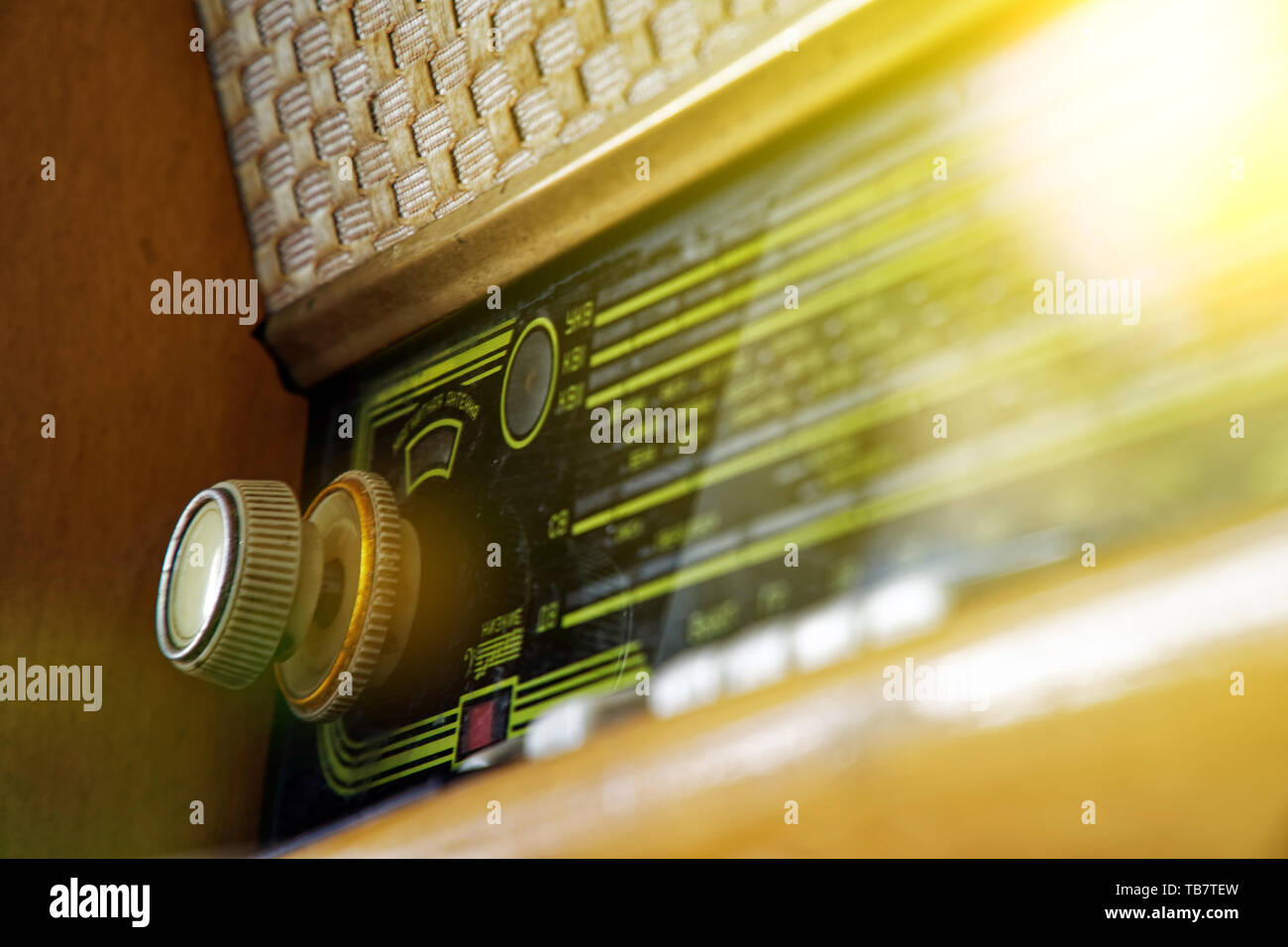 Vintage style radio in wooden box and fabric front Stock Photo - Alamy