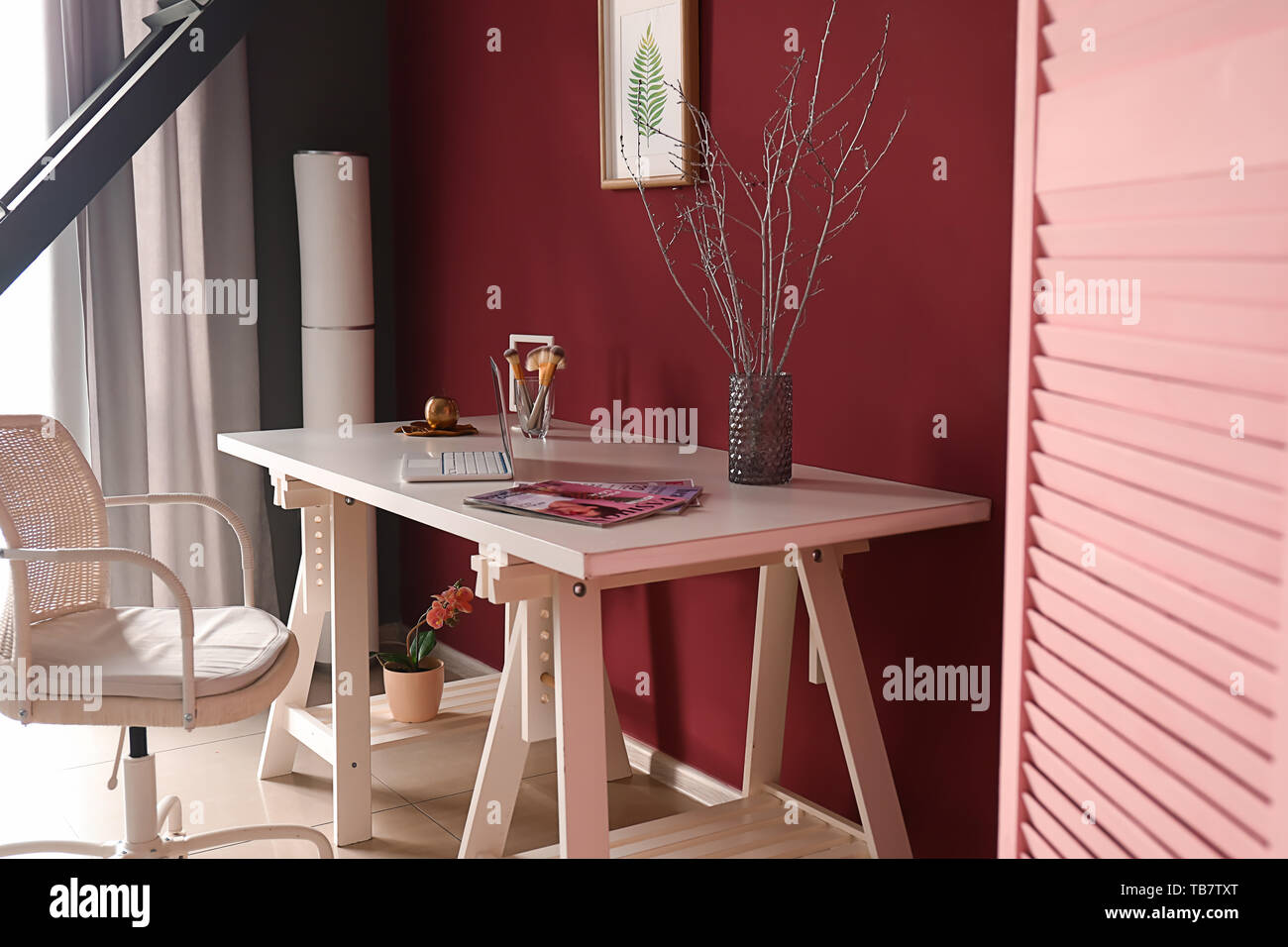 Stylish workplace in interior of modern room Stock Photo - Alamy