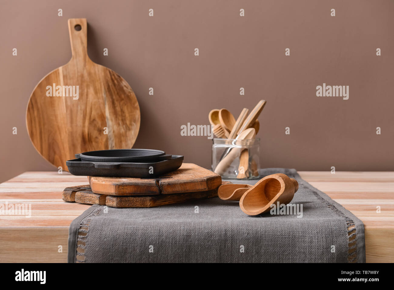 Set of kitchen utensils on table Stock Photo - Alamy