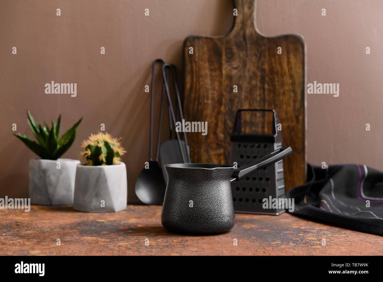 Set of kitchen utensils on table Stock Photo - Alamy