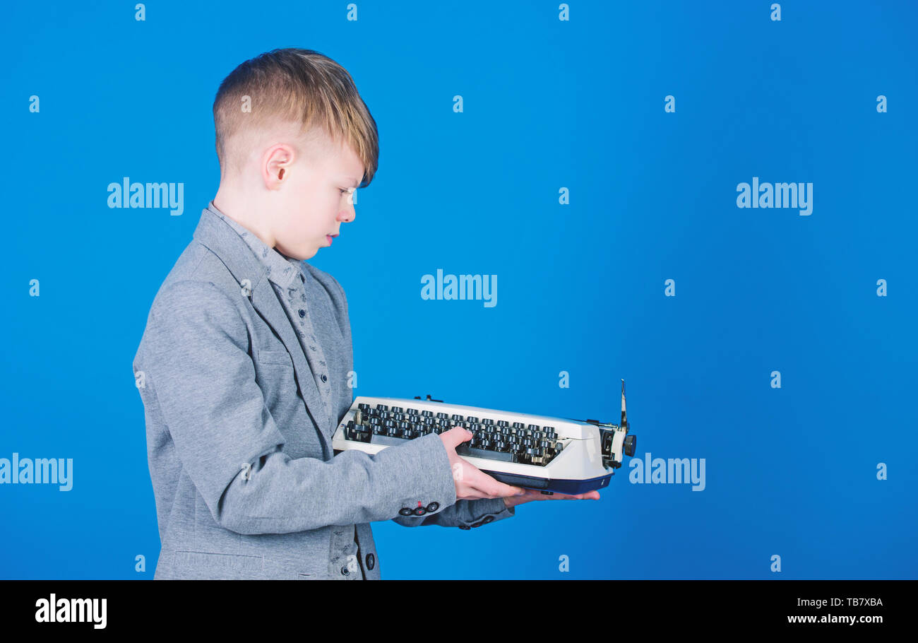 How does a retro typing machine work. Smart child using retro ...