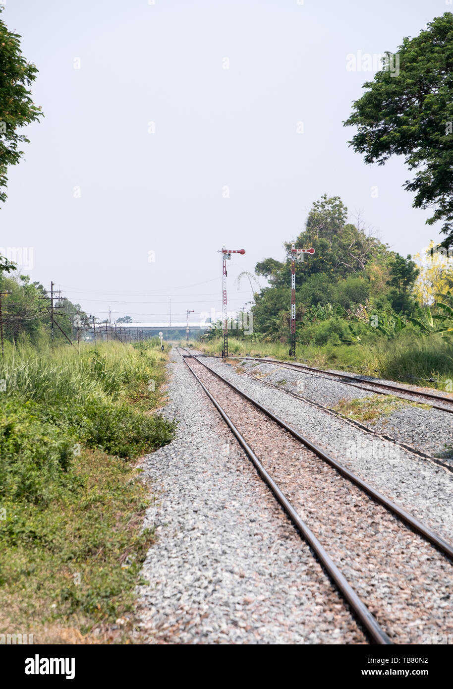 Traffic signal pole in the railway yard of the rural station in the ...
