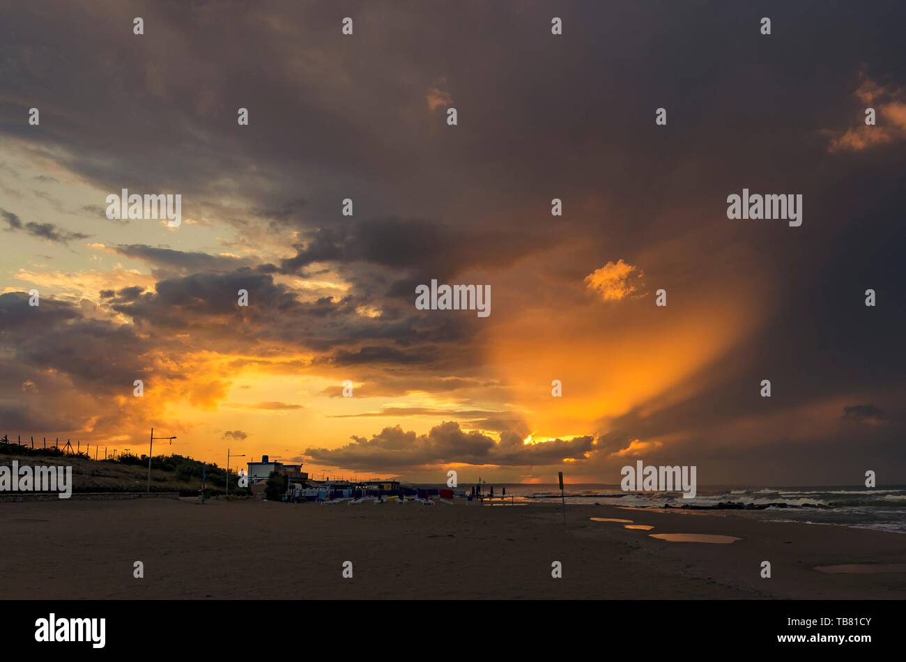 Beautiful orange sunset sky on the beach Stock Photo - Alamy