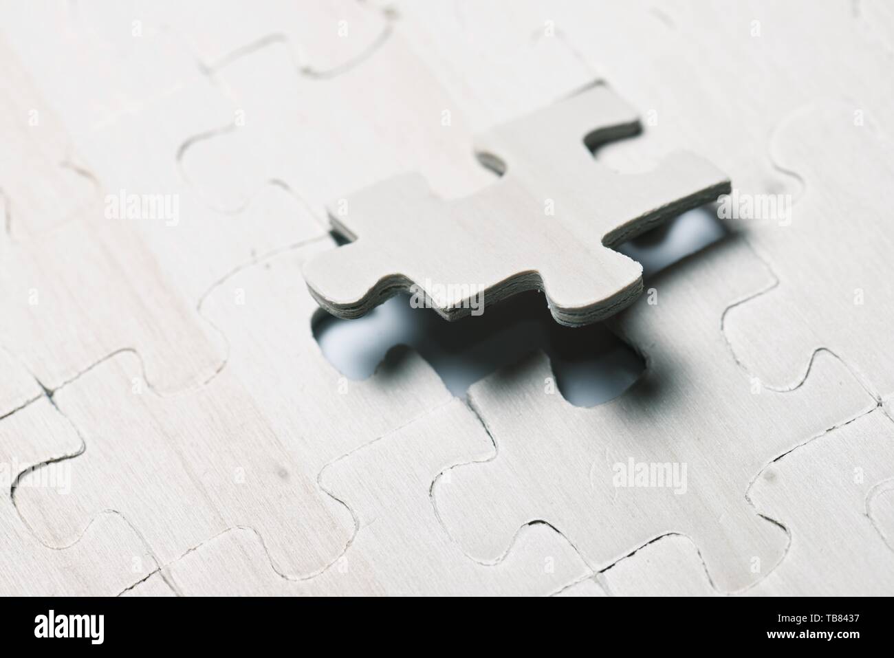 Close up of the pieces of a puzzle Stock Photo - Alamy