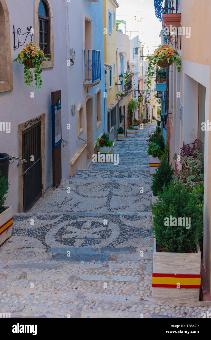 Calpe, Alicante, Spain. May 10, 2019: Puchalt street, narrow street ...