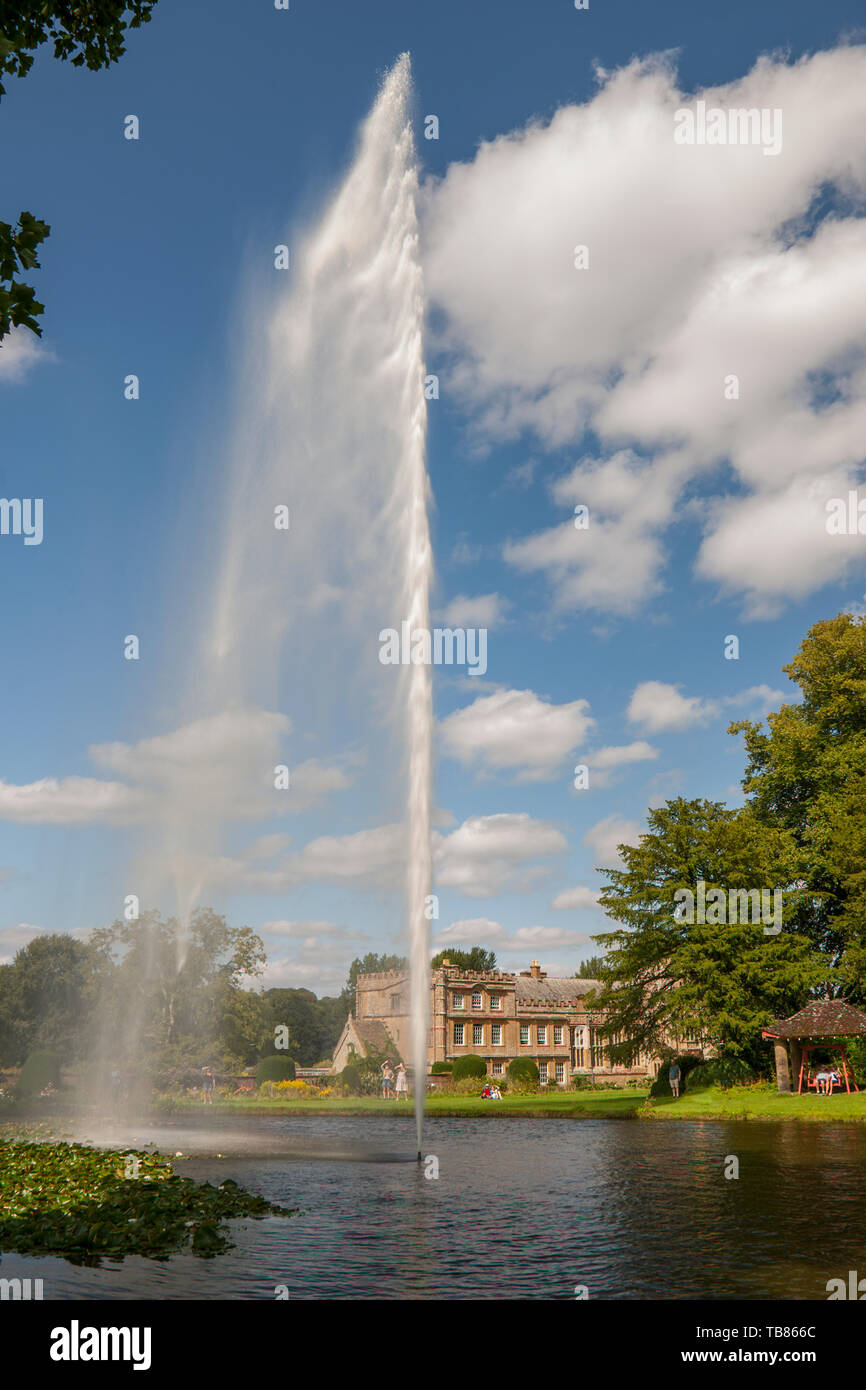 The spectacular Centenary Fountain in the Mermaid Pond at Forde Abbey ...