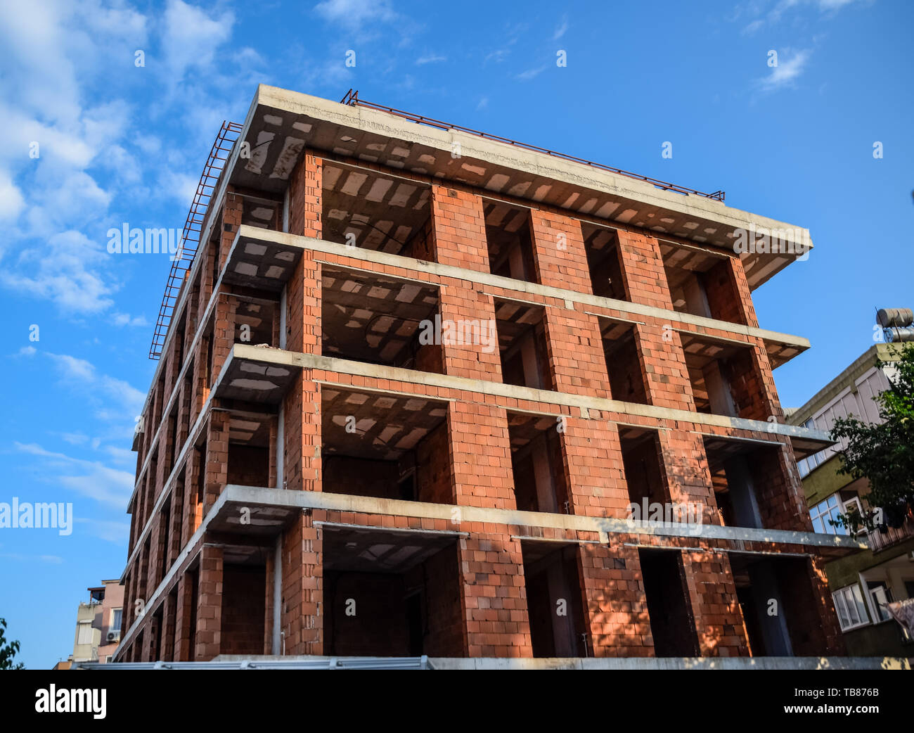 Construction of a new house of bricks. High-rise construction Stock ...