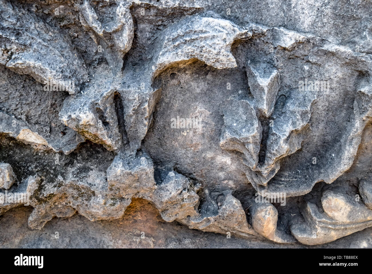 The element of the gate of Hadrian on the ground near the gate. Ruins ...