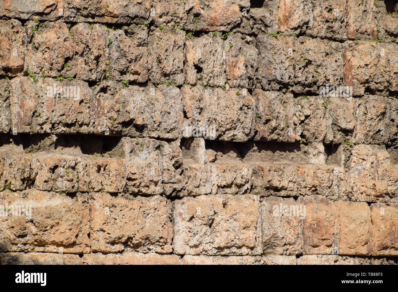 The wall near the gate of Hadrian, the texture of the stone walls of ...