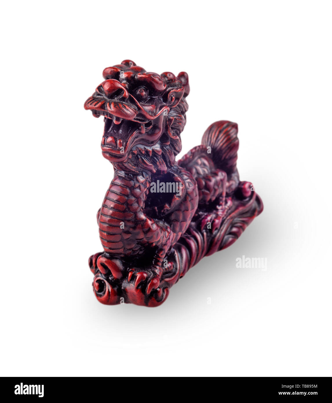 small dragon figurine isolated on white background Stock Photo - Alamy