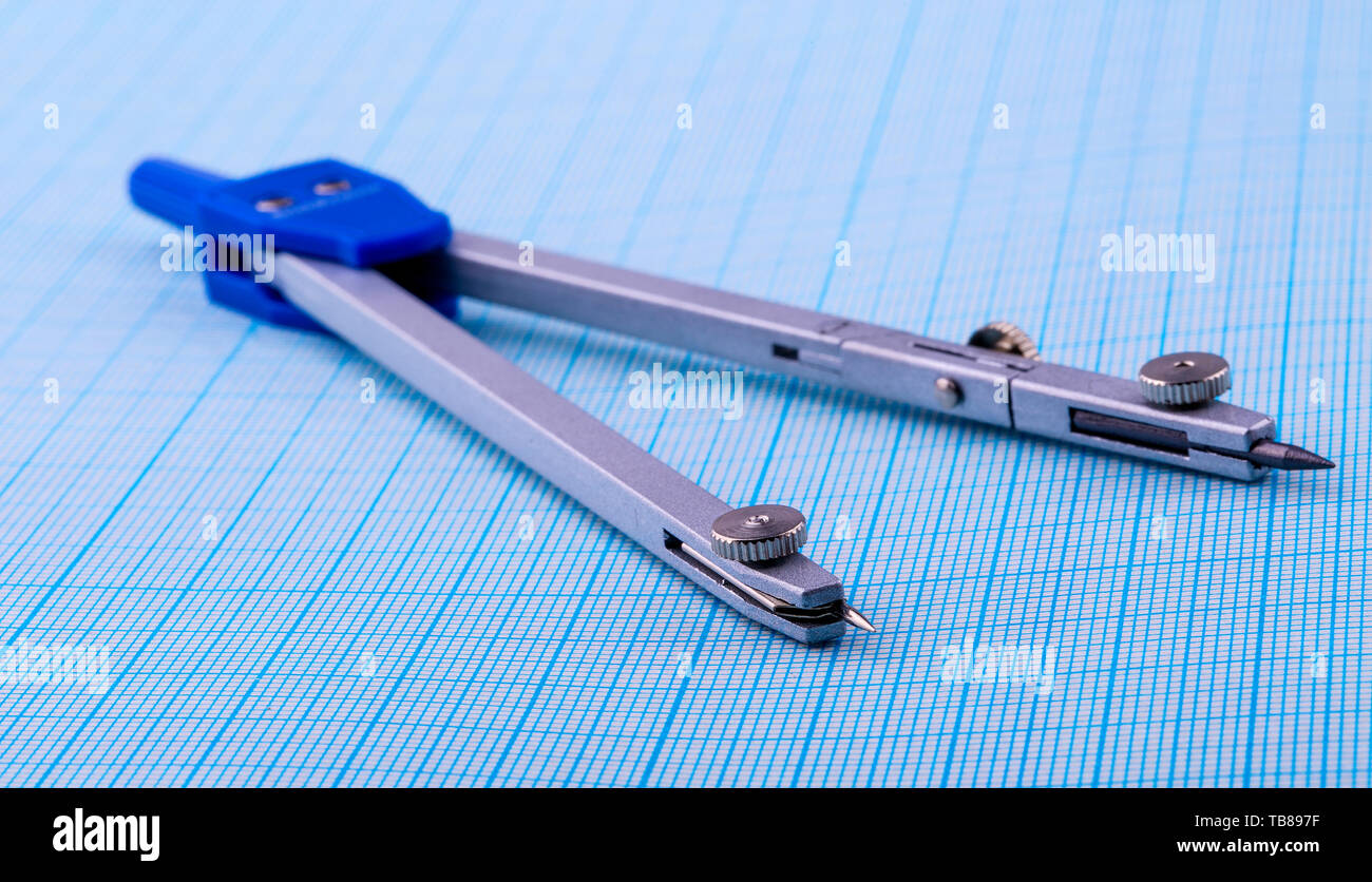 Objects for sketching and of work on graph paper Stock Photo - Alamy
