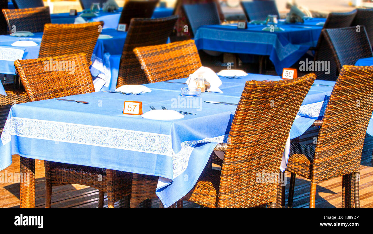 empty tables in the summer cafe Stock Photo - Alamy