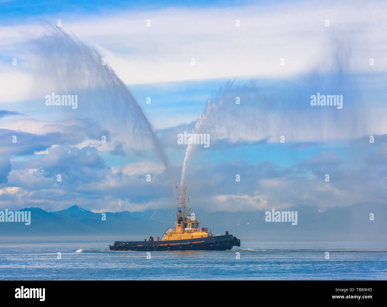 Ship spraying water cannon hi-res stock photography and images - Alamy