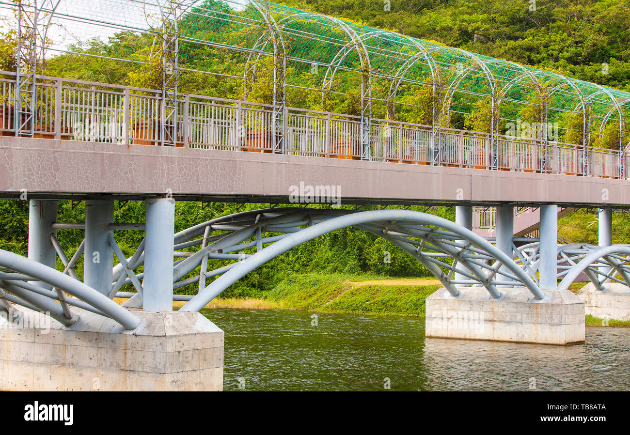 Bridge crossing over the river Stock Photo - Alamy