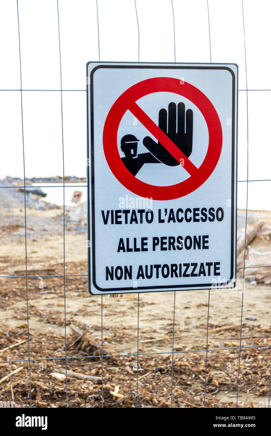 Warning sign reading: 'no entry unauthorised personnel' near a ...