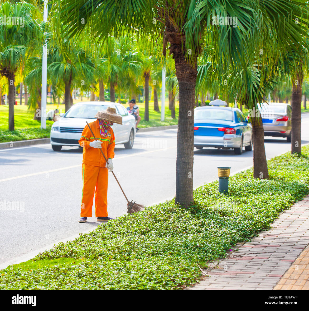 cleaner garbage on the street in China Stock Photo - Alamy