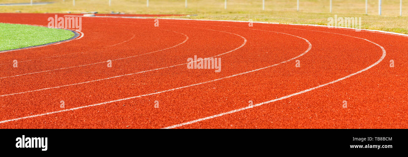 turn on the red racetrack at the stadium Stock Photo - Alamy
