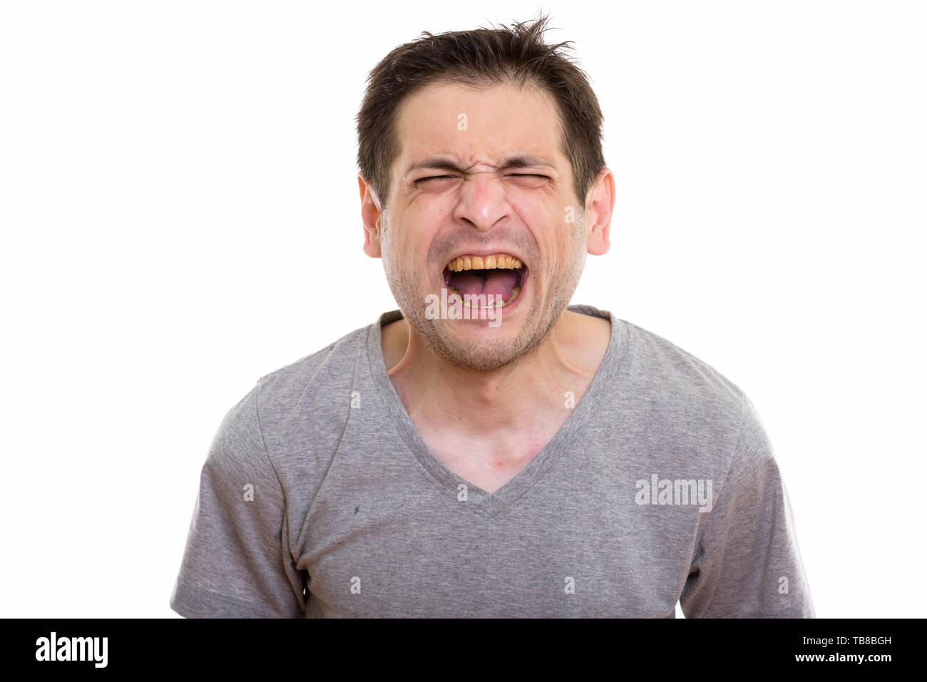 Studio portrait of man isolated against white background Stock Photo ...
