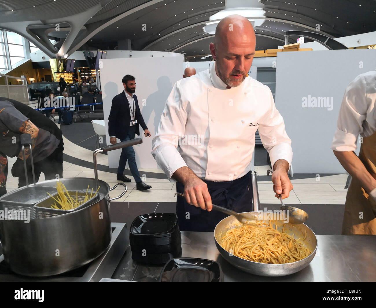 Rome, Italy. 30th May, 2019. Michelin-star chef Daniele Usai cooks ...