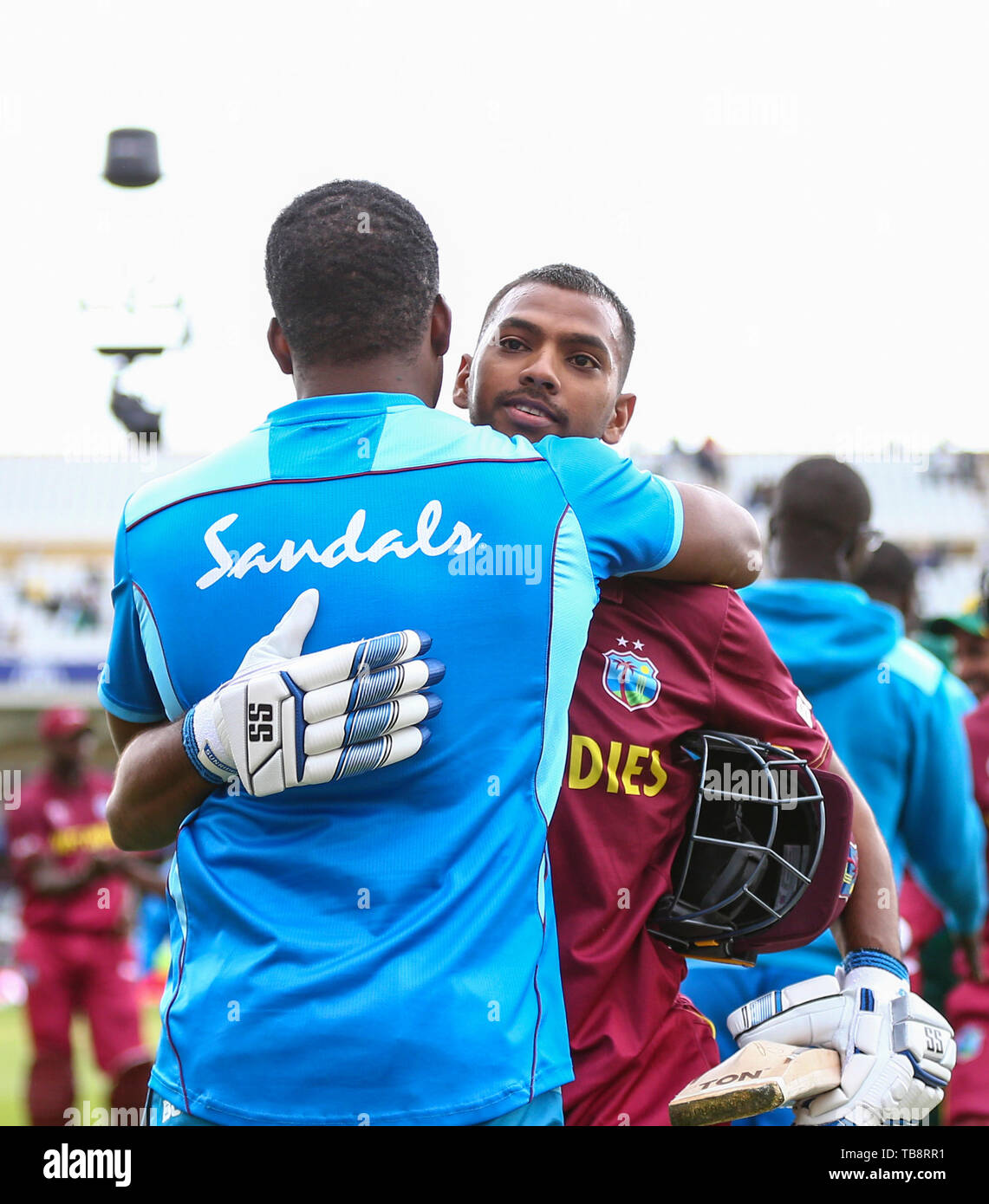 Cricket hug hi-res stock photography and images - Alamy