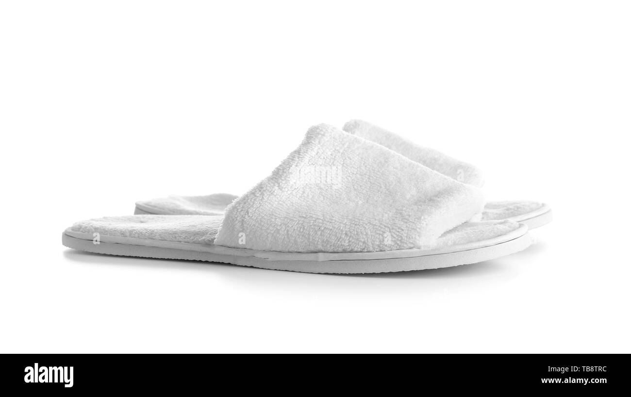 Soft slippers on white background Stock Photo - Alamy