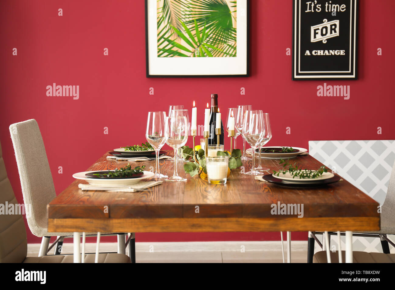 Beautiful table setting in dining room Stock Photo - Alamy