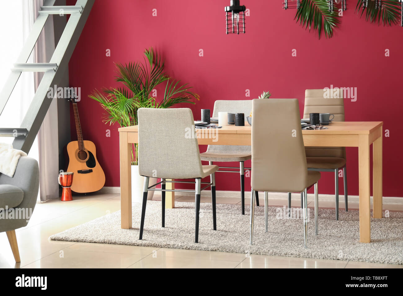 Beautiful table setting in interior of room Stock Photo - Alamy