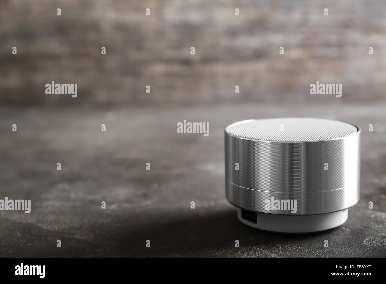 Smart home assistant device on grey table Stock Photo - Alamy