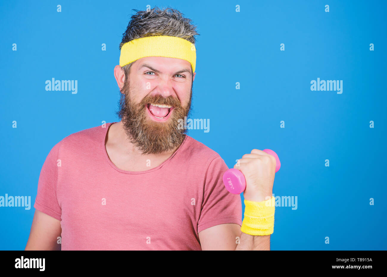 Sportsman retro outfit training blue background. Athlete training with ...
