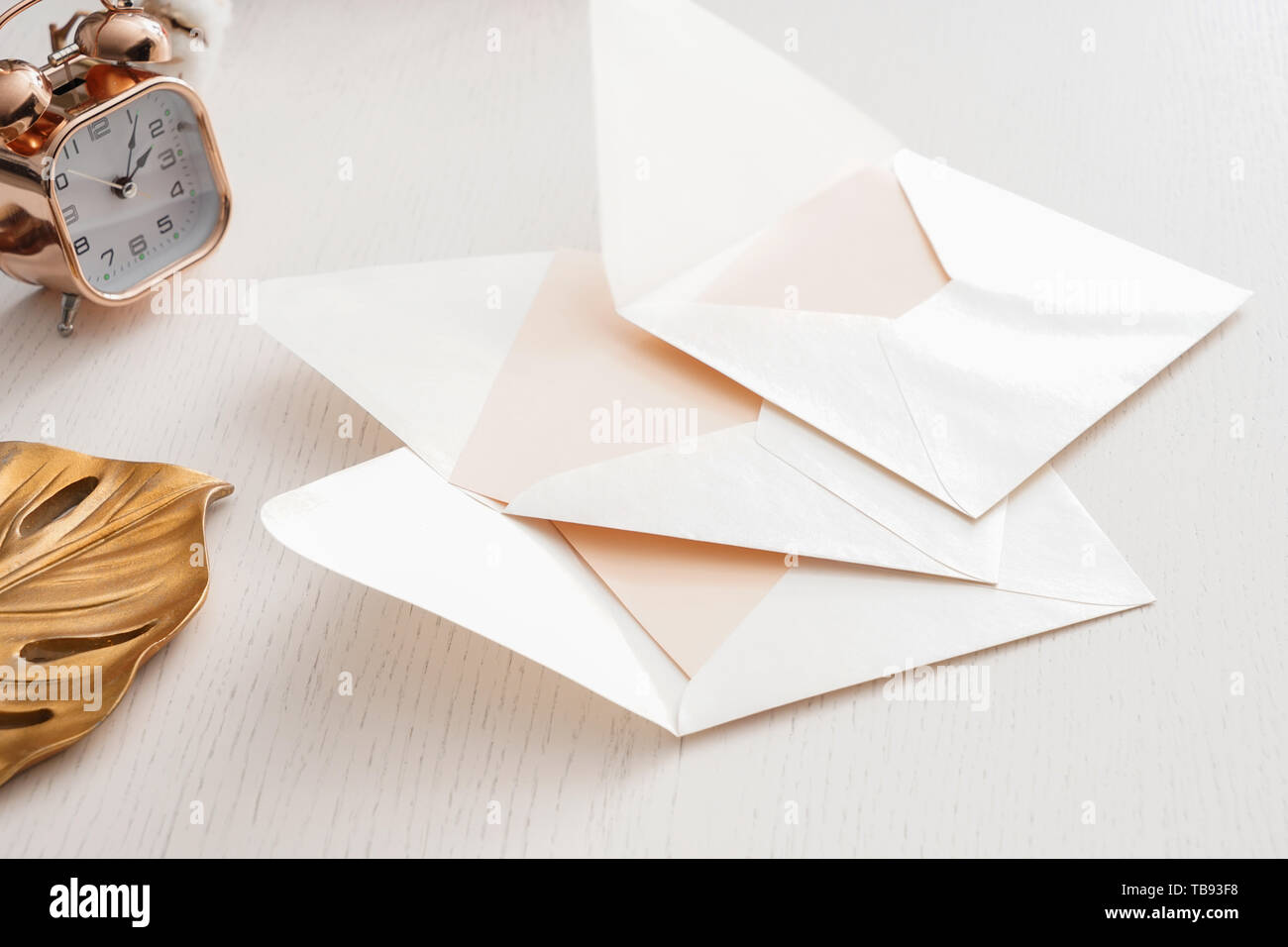 Blank envelopes on table Stock Photo - Alamy