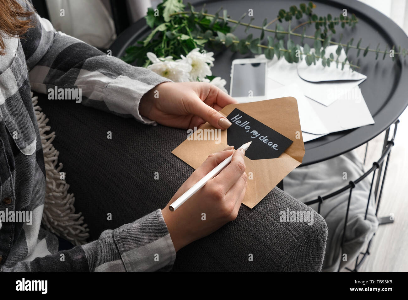 Young woman writing letter hi-res stock photography and images - Alamy