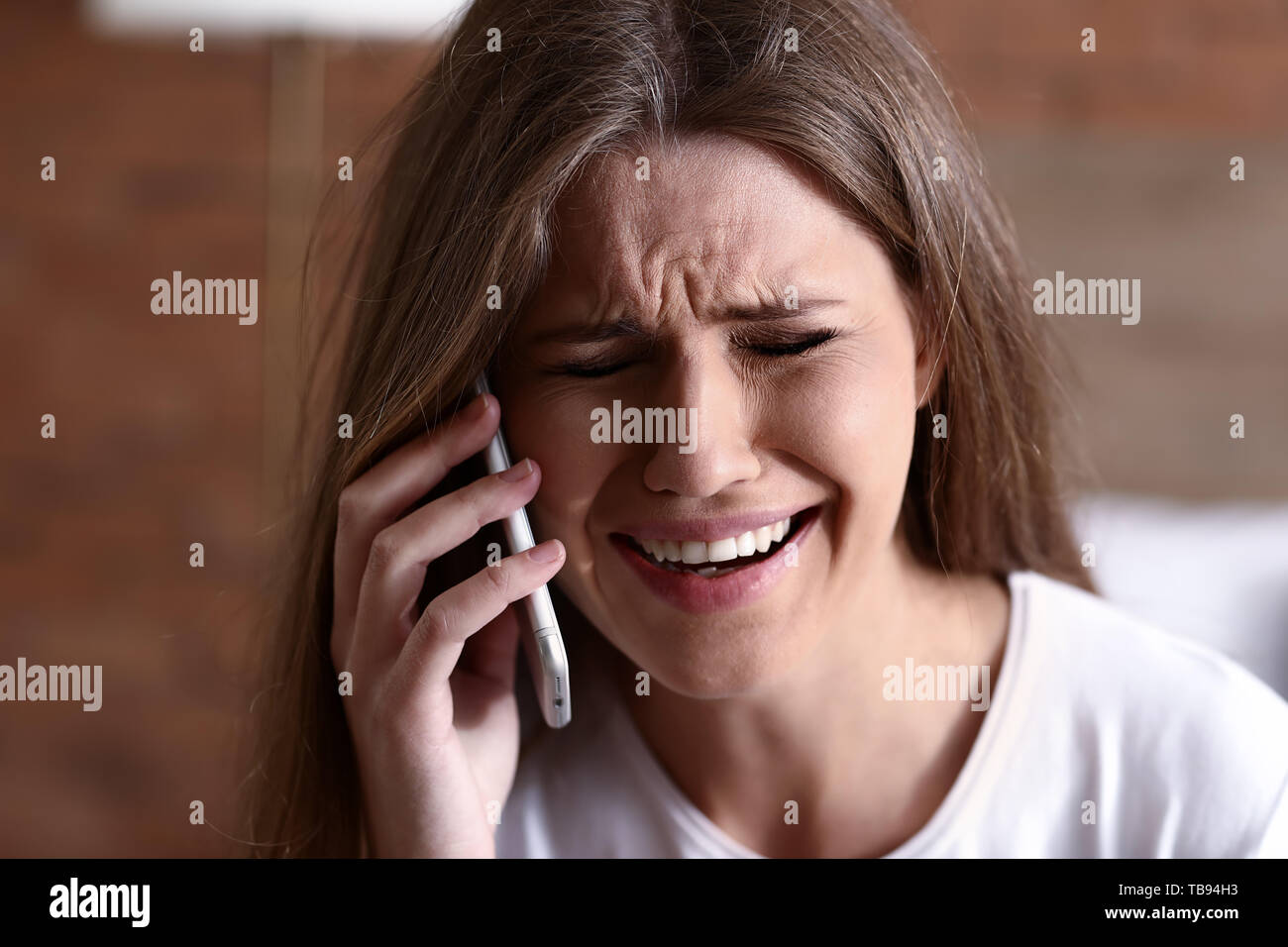 Young afraid woman calling for help at home. Suicide concept Stock ...