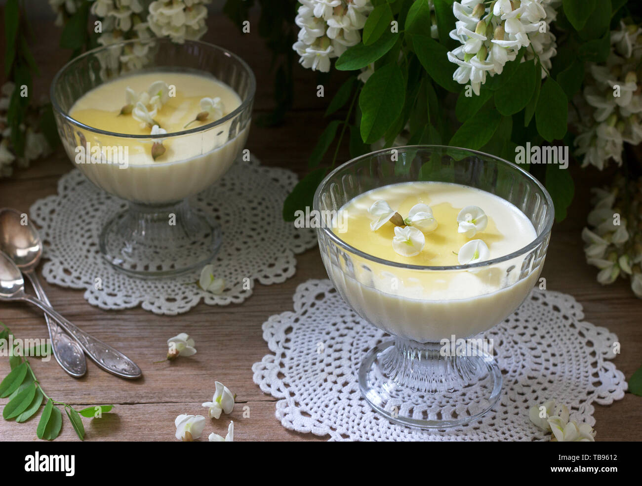 Panna cotta with robinia flavor, served with honey and white Robinia ...