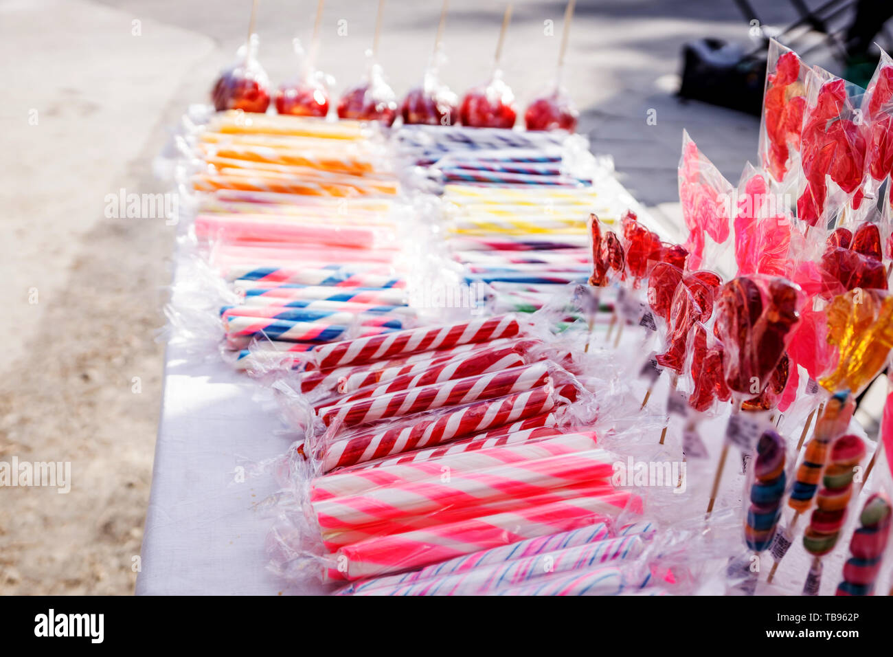 Close-up of colorful sugar sticks, sweet temptation in bright, fresh ...