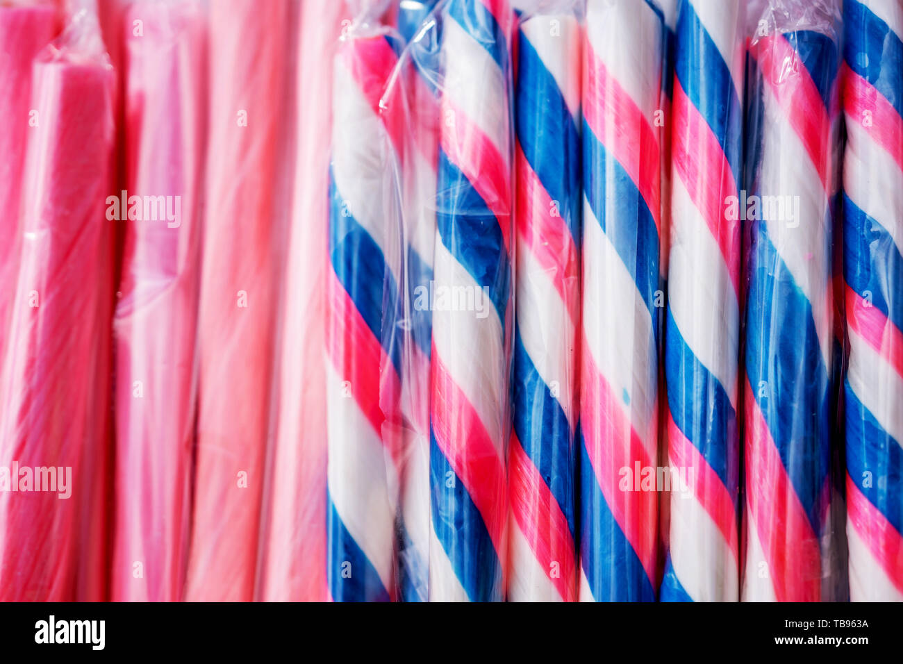 Close-up of colorful sugar sticks, sweet temptation in bright, fresh ...