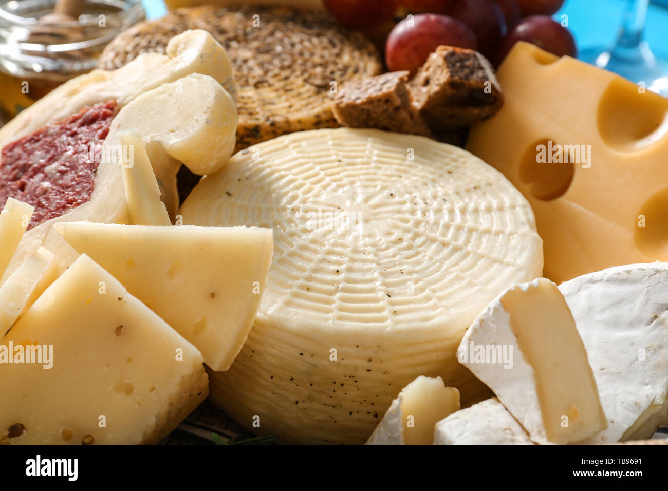 Assortment of tasty cheese, closeup Stock Photo - Alamy