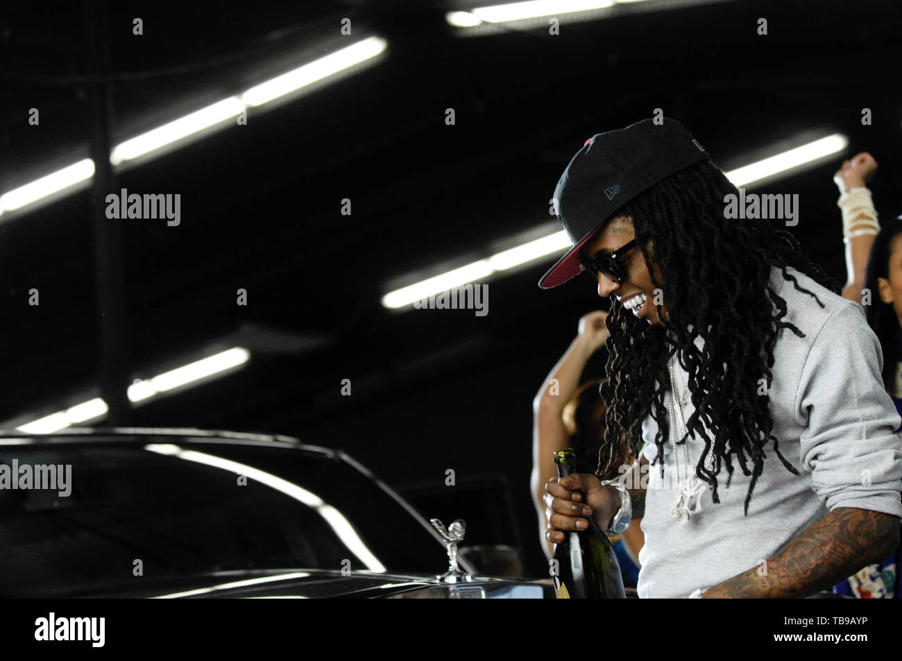 Rapper Lil Wayne on the set of his music video with Young Money called ...