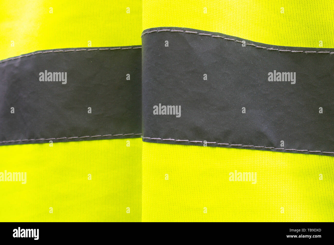 Closeup of Yellow High Visibility Neon Vest Stripe Stock Photo - Alamy
