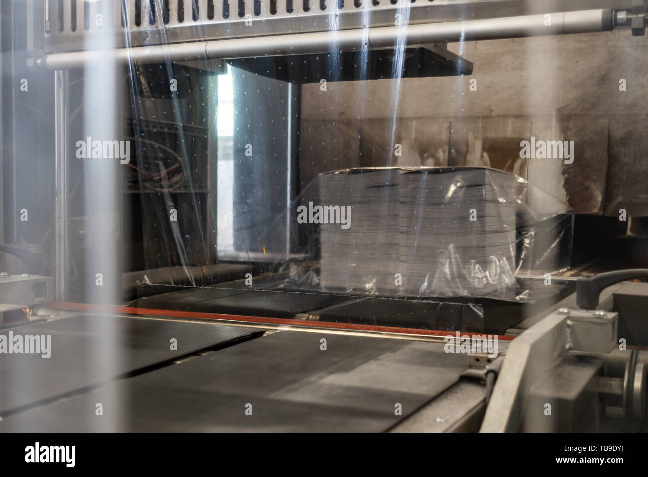 Plastic wrapping books hi-res stock photography and images - Alamy