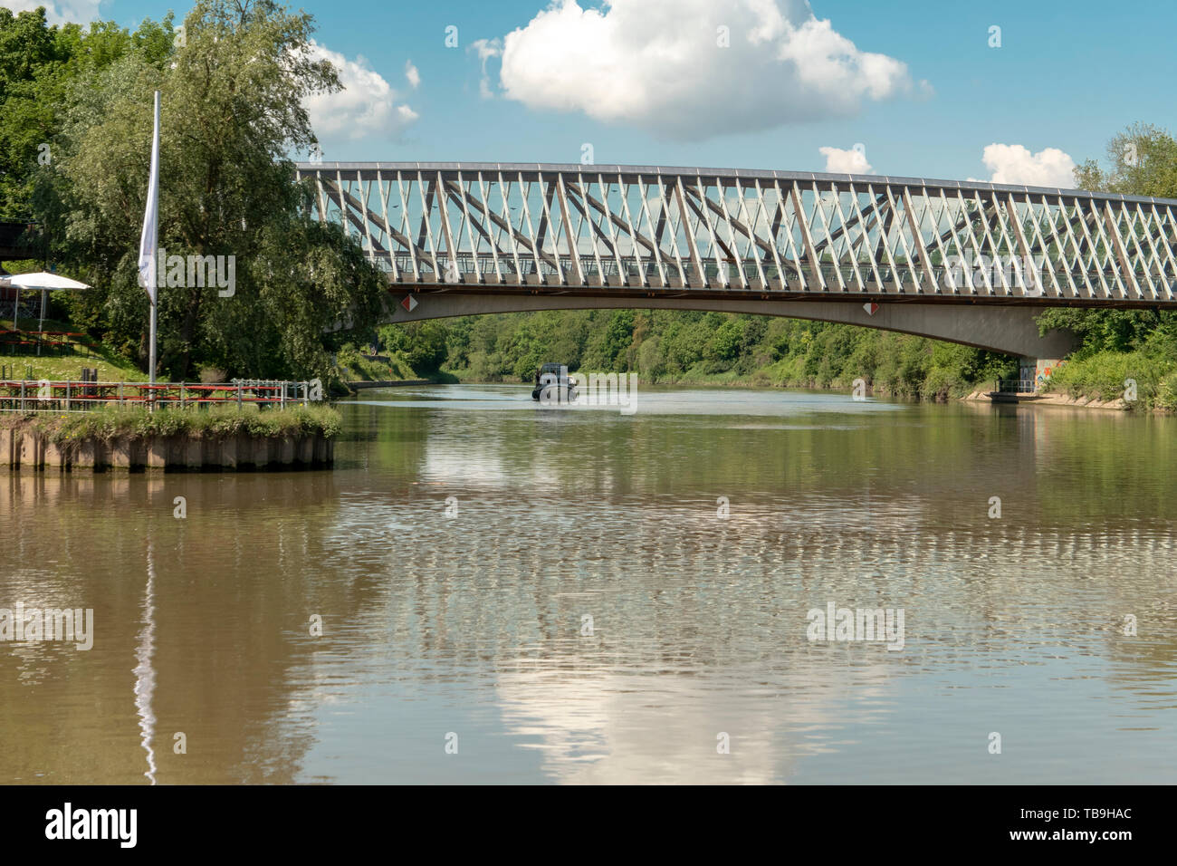 Bridge over the river Neckar with rib pattern and reflection on the ...