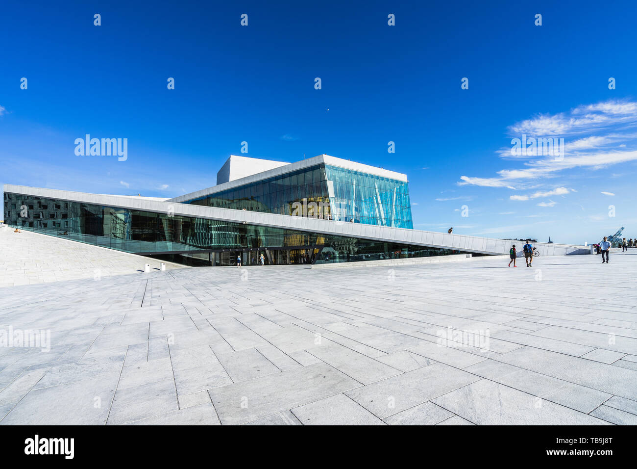 Oslo Opera House has distinctive architectural style and is covered by ...