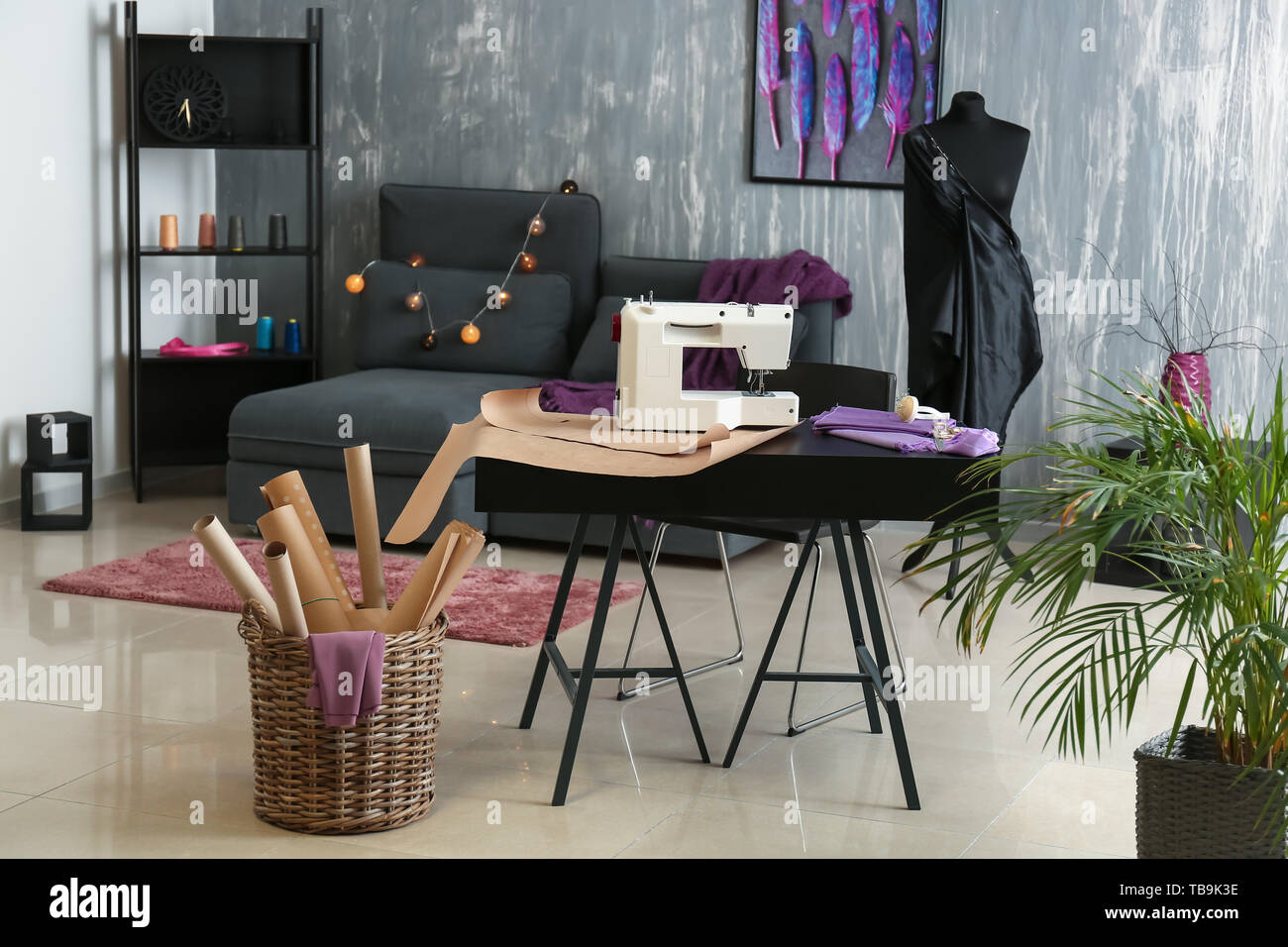 Stylish workplace of tailor with sewing machine in workshop Stock Photo ...