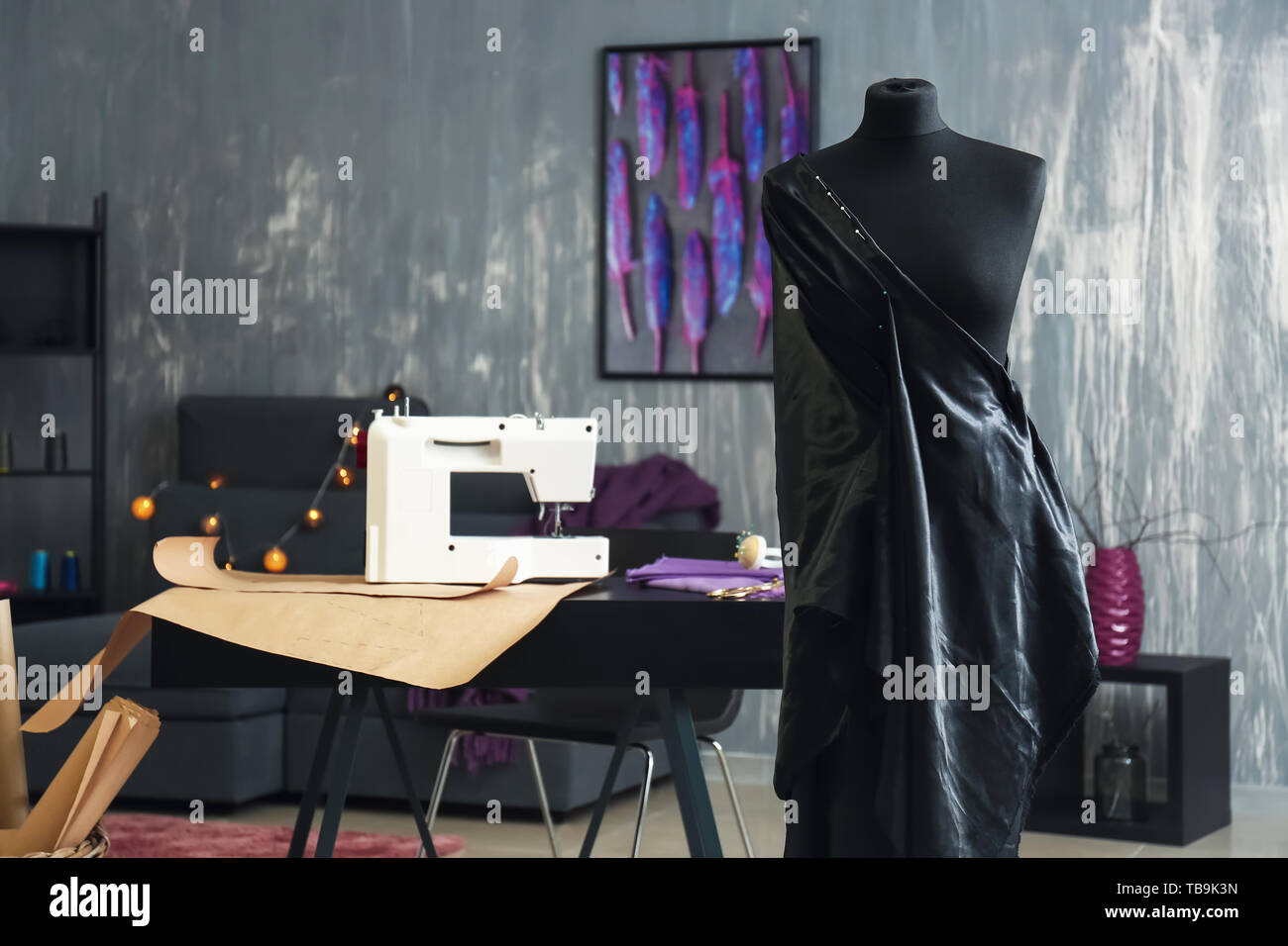 Mannequin with unfinished clothes in atelier Stock Photo - Alamy