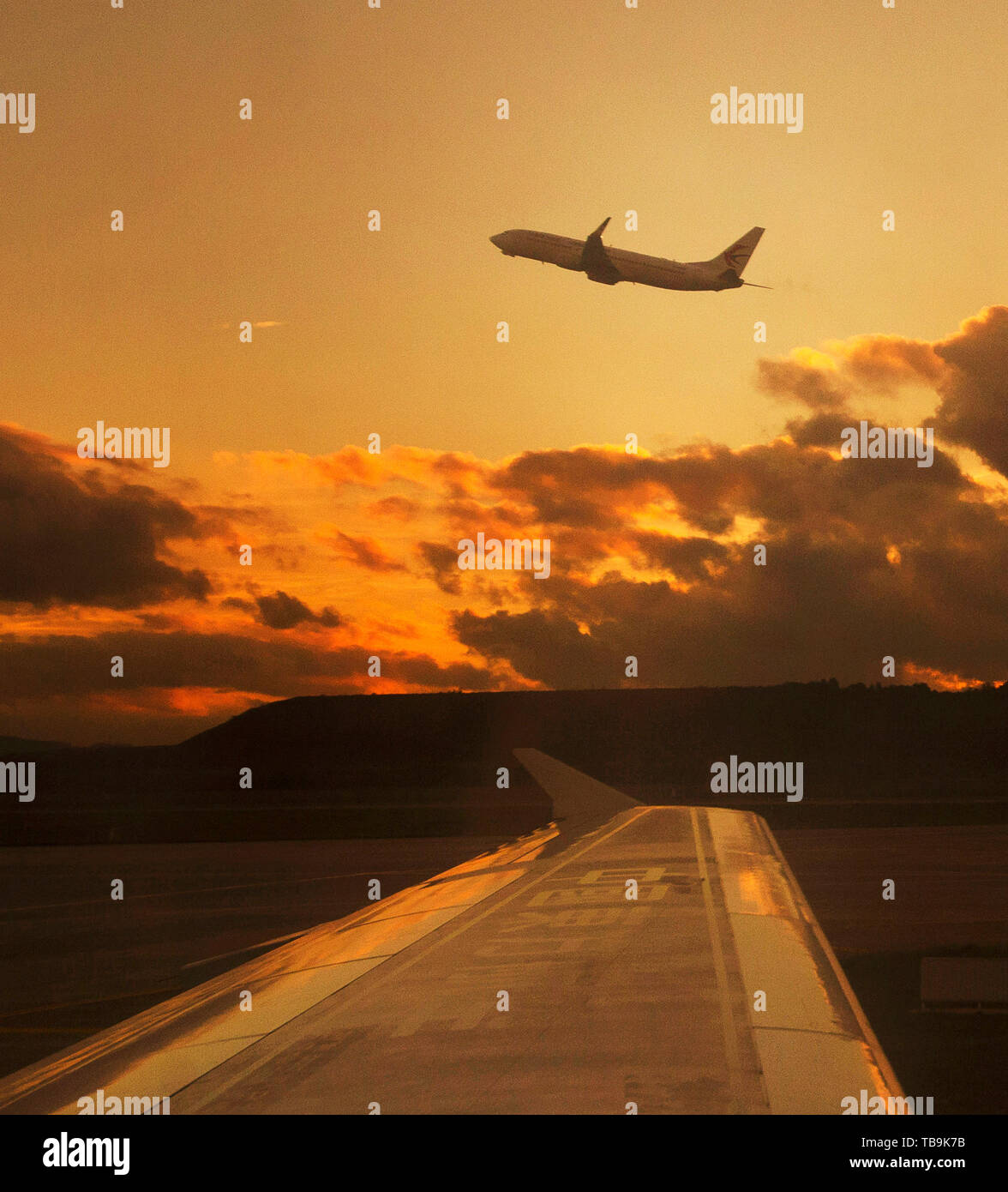 Double wings, two planes, one take off, one landing and sliding Stock ...